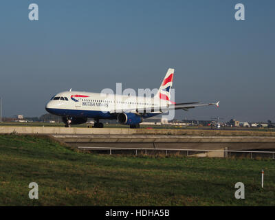 A British Airways Airbus A320-232 (G-EUYN) landing on runway 18R at ...
