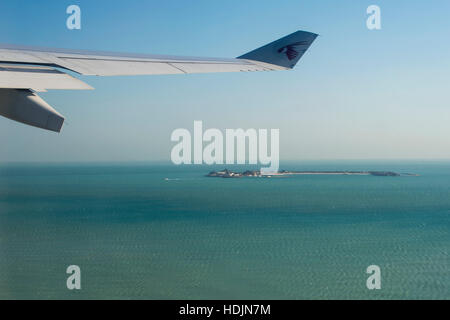 View from cabin window of a Qatar Airways flight Stock Photo - Alamy