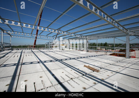 Construction site with PCC plank floor deck,structural steel frame and ...