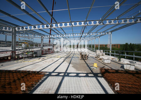 Construction site with PCC plank floor deck,structural steel frame and ...