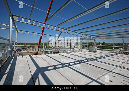 Construction site with PCC plank floor deck,structural steel frame and ...