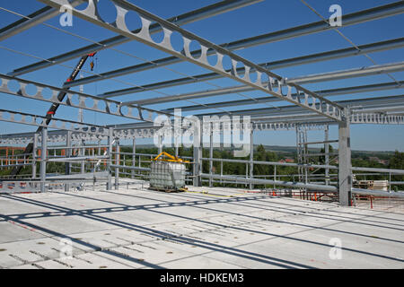 Construction site with PCC plank floor deck,structural steel frame and ...