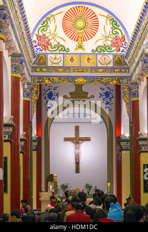Congregation receiving communion at Tianshuijing Catholic Church, Xian ...