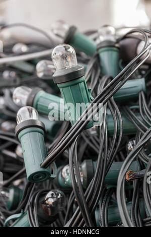 Mess of tangled old-style Christmas lights. Close-up Stock Photo - Alamy