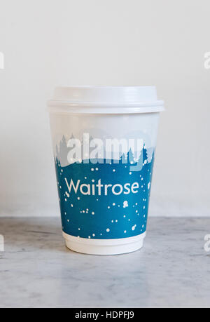 Waitrose take away Christmas disposable coffee cup held in ladies hands ...