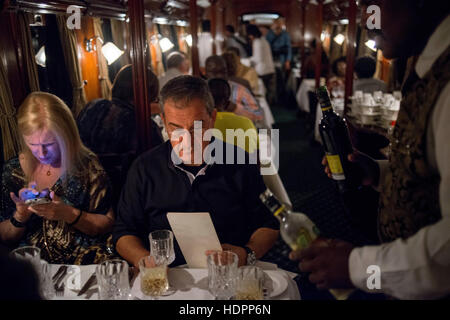 Inside the restaurant railway carriage of Royal Livingstone Express ...