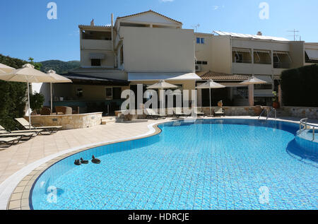 Resort buildings with a pool on a sunny day Stock Photo - Alamy