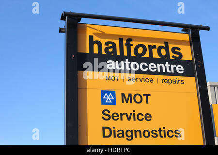Halfords AutoCentre sign Stock Photo - Alamy