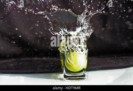 Jujube fruits water splash Stock Photo - Alamy