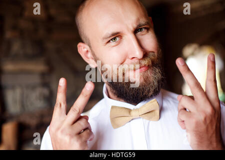 bride groom at wedding party. bearded man in bow tie with tulip flowers ...