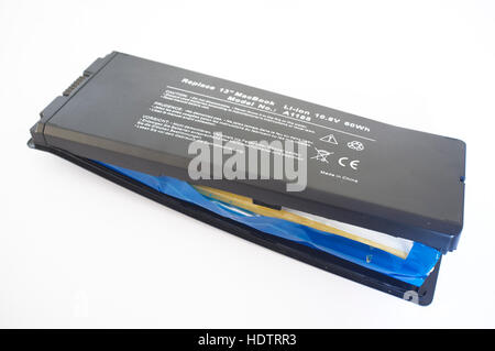 Swollen laptop batteries Stock Photo - Alamy