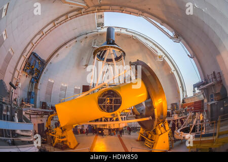 Interior view of an observatory dome and telescope pointed at the sky Stock Photo - Alamy