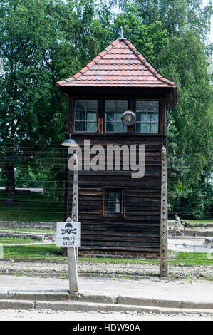 One of the surviving Nazi sentry guard towers and a warning sign ...