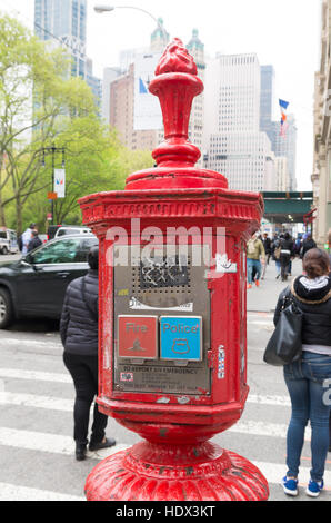 An old red fire call box in NYC. Typically installed on street corners ...