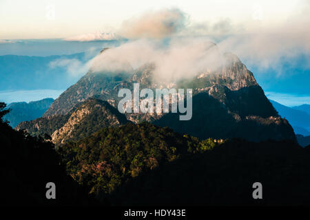 High mountain ridge in thick fog Stock Photo - Alamy