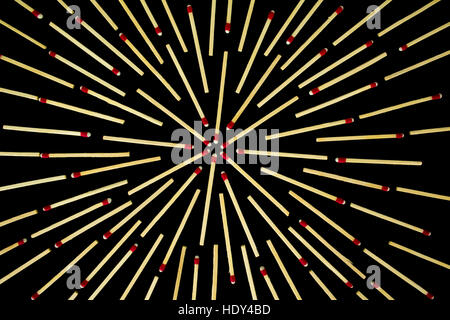 A complex star design with strike-anywhere matches, isolated on a black ...