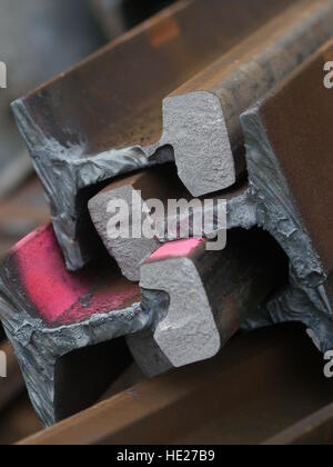 Pile Of Old Rusty Rails Stock Photo - Alamy