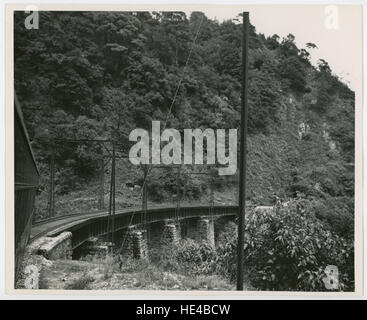 A historic image of a railroad bridge, showcasing its design and ...