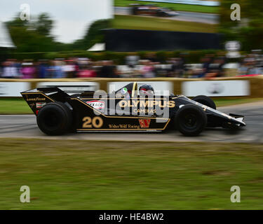 Wolf Cosworth WR7 Grand Prix, Formula 1 race car racing up the hill ...