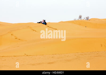 Tourists in the desert at Shapotou Scenic Area, Zhongwei, Ningxia ...