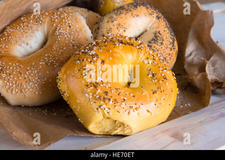Variety of assorted authentic New York style Bagels with seeds in a ...