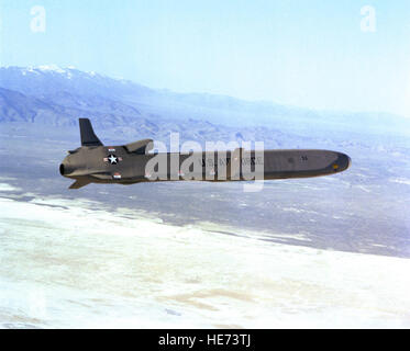 A side view of an AGM-86 air-launched cruise missile (ALCM) in flight ...