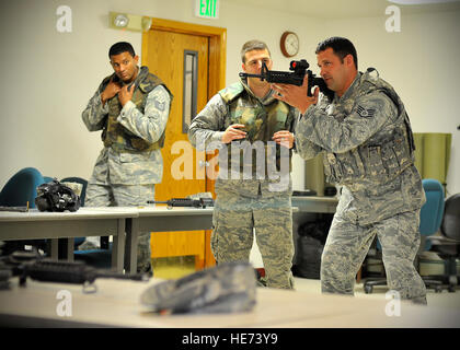 A 354th Security Forces Squadron team launches a drone March 20, 2024 ...