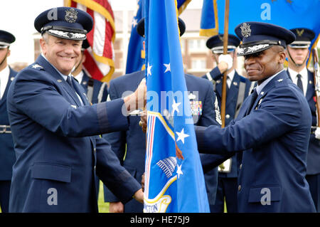 Maj. Gen. Darren W. McDew and Maj. Gen. Sharon K.G. Dunbar listen to ...