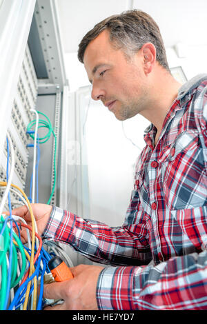 connecting the wires Stock Photo - Alamy