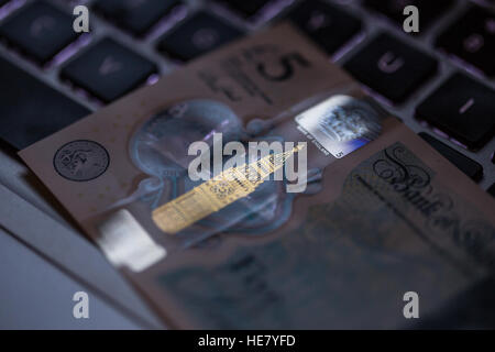 Low light photo showing the hologram and see through section of the new ...