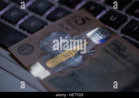 Low light photo showing the hologram and see through section of the new ...