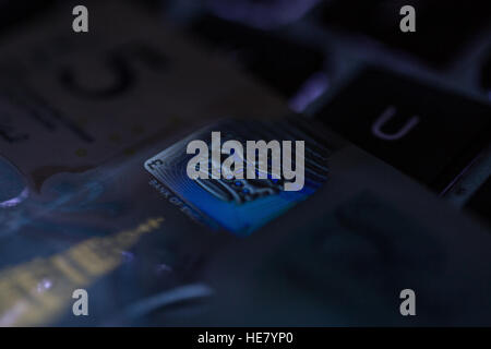 Low light photo showing the hologram and see through section of the new ...