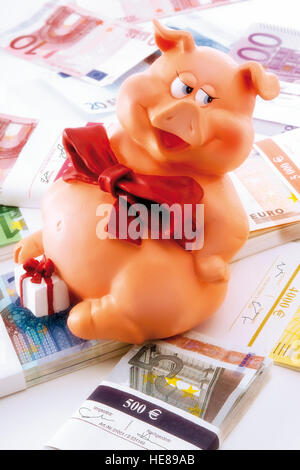 Euro bills (Euro banknotes) with a pig as a good luck symbol in Germany ...