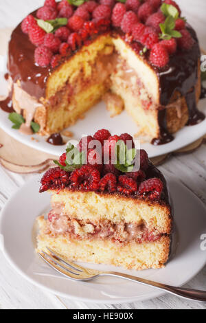 sponge cake with berries on pink background Stock Photo - Alamy