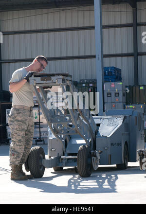 Aerospace Ground Equipment personnel at Holloman Air Force Base use a ...