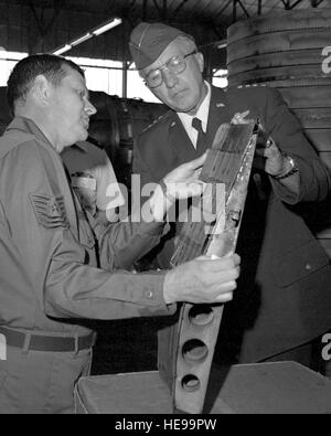 A master sergeant briefs GEN Bryce Poe, commander, Air Force Logistics ...