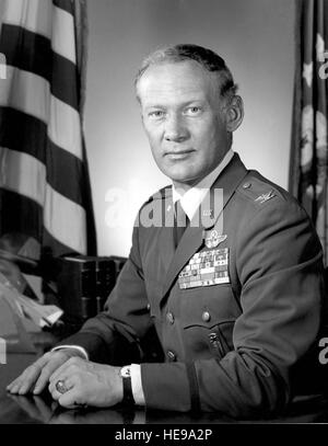 U.S. Air Force Col. Buzz Aldrin, retired, left, gets a kiss from his ...