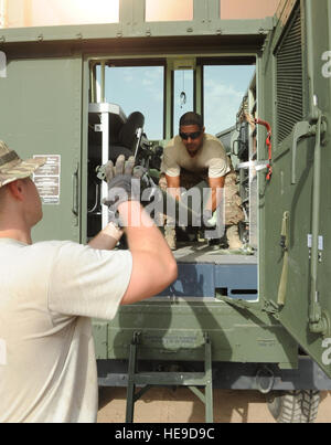 The MSN-7 mobile air traffic control tower is deployed from a Humvee ...