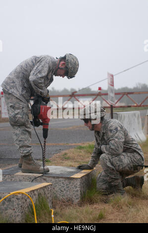 U.S. Air Force civil engineers assigned to the 554th Red Horse Squadron ...