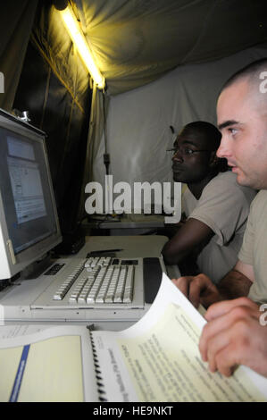Spc. Wayne Landry (front) and Sgt. Eric Simpson (back), both early ...