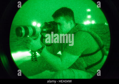 U.S. Army Spc. Michael Cox, assigned to the 982nd Combat Camera Company ...