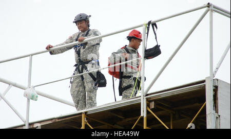 Staff Sgt. Cory Ito, Hawaii National Guard CERFP team, collects an ...