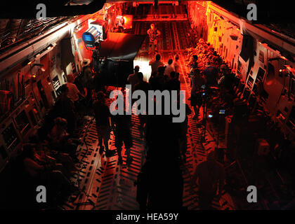 Air Force personnel manage logistics, operational support, and ...