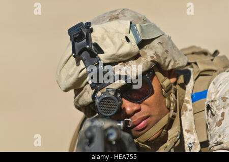 A US Marine Corps Weapons Technician Loads 20mm High Explosive Rounds ...