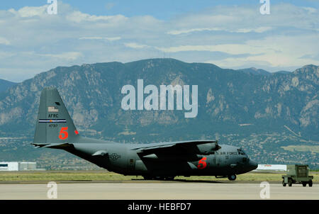 U.S. airmen from the 302 Airlift Wing from Peterson Air Force Base use ...