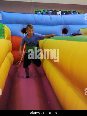 Children play on a field where events are held to celebrate the Dragon ...