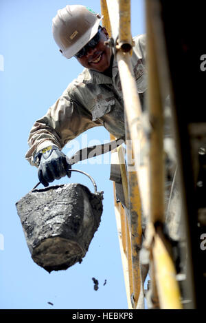 US Navy U.S. Navy Seabee, Construction Mechanic 3rd Class assigned to ...