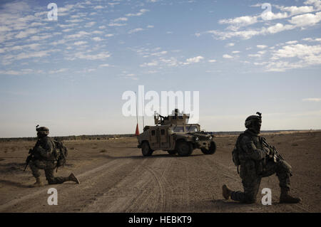 U.S. Army Soldiers search the remains of a home destroyed by joint ...