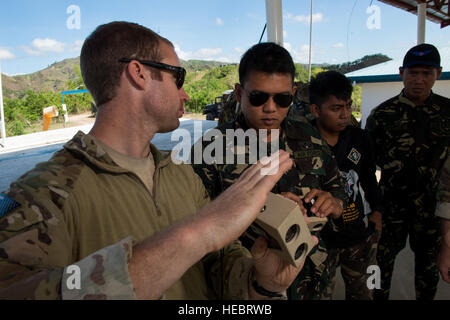 A Philippine Air Force airman with 710th Special Operations Wing poses ...