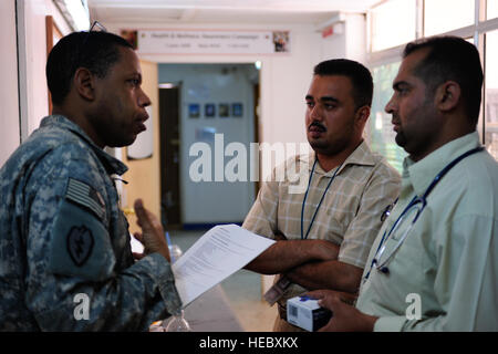 Nurses from Tikrit General Hospital conduct a practical exercise prior ...
